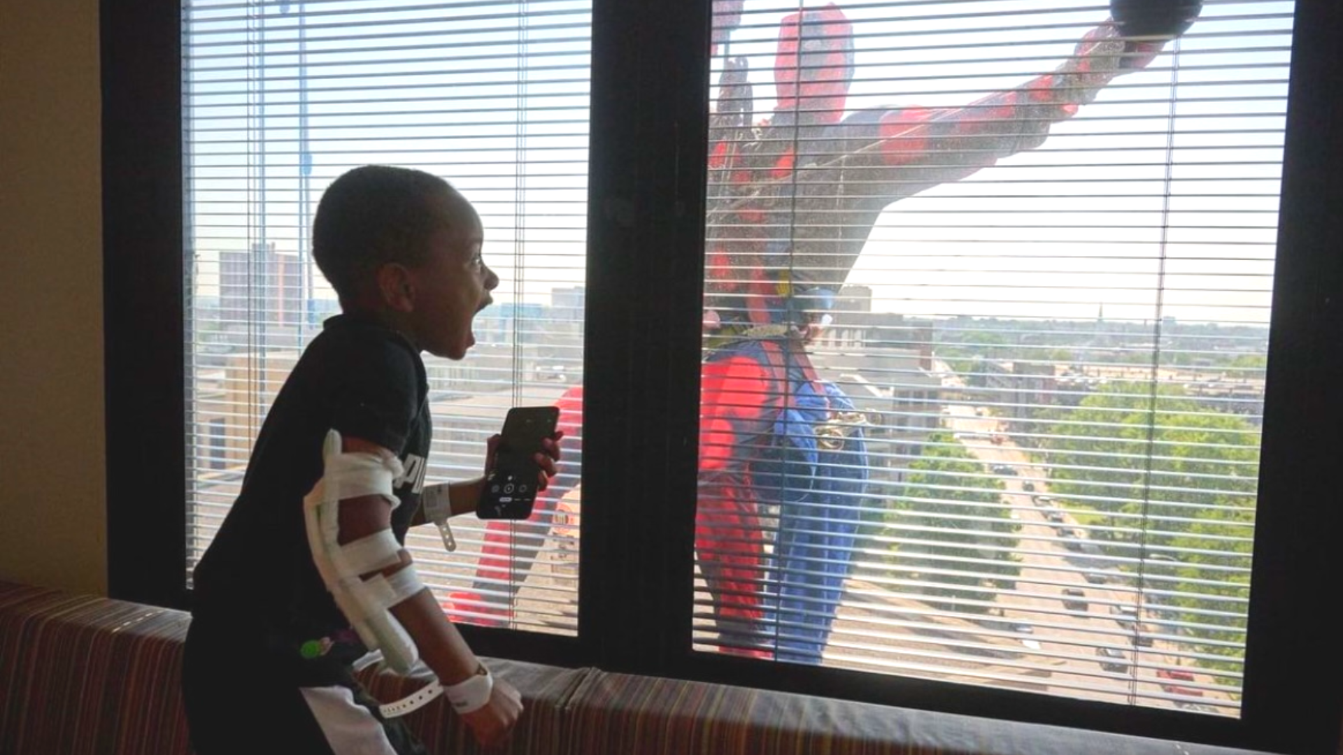 Superhero Window Washers Delight Children's Hospital Patients